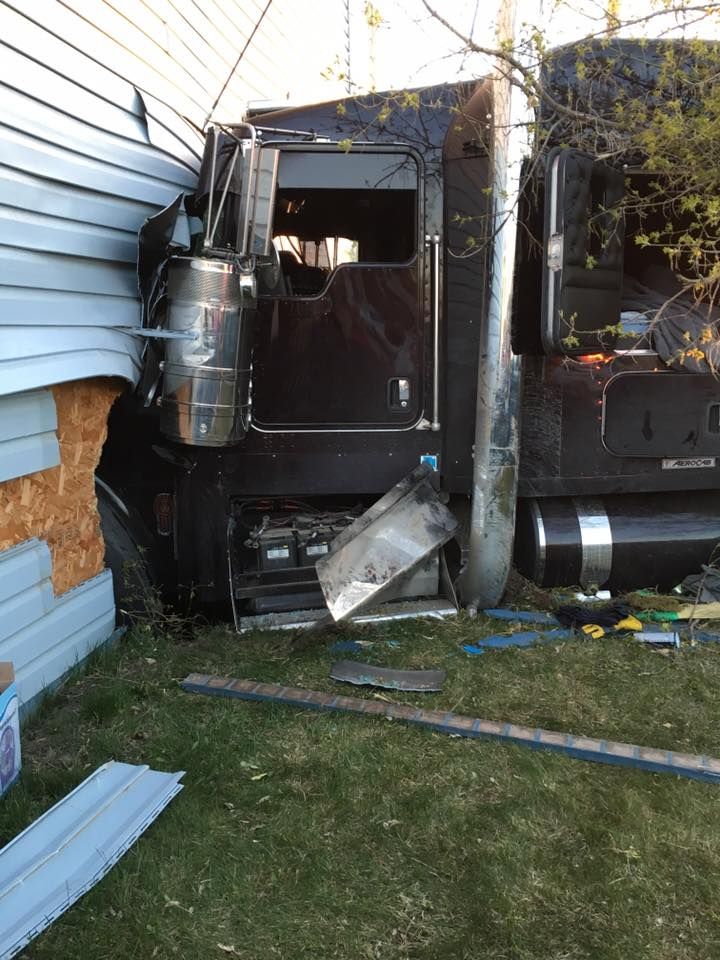 Semi truck drives straight into northern Alberta apartment building ...