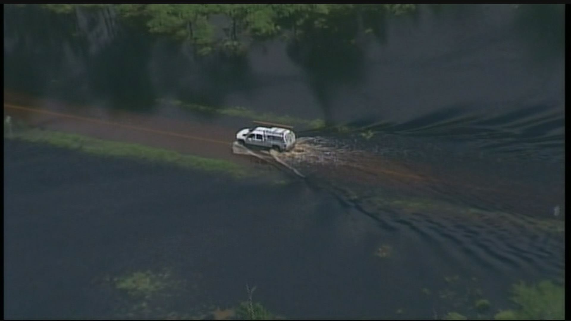 Whiteshell flooding: Aerial look of road and yard washouts near Caddy ...