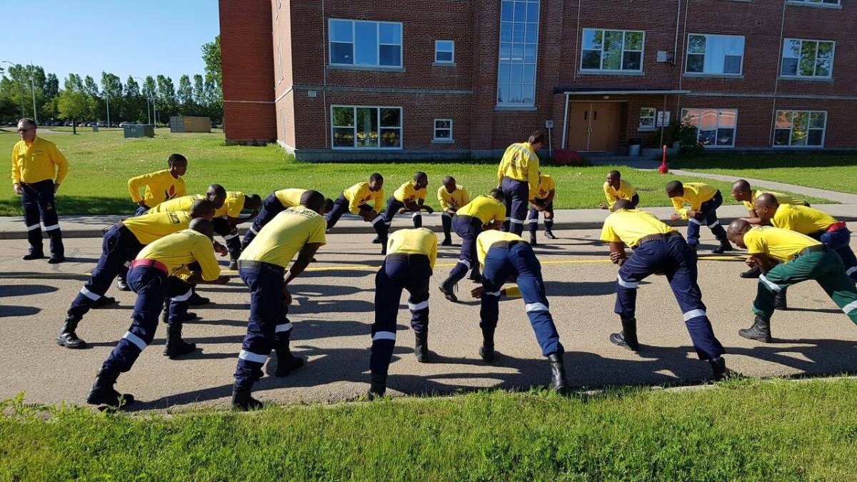 South African firefighters start fighting Fort McMurray wildfire ...