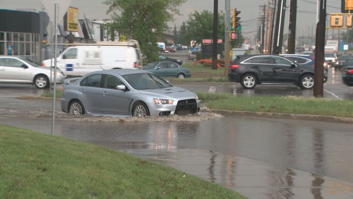 Edmonton streets flooded as city battered by rain during thunderstorm ...