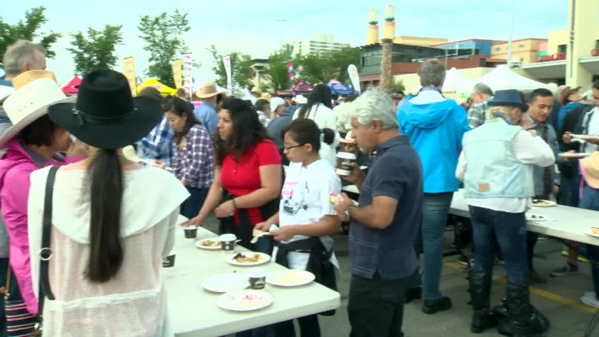 Volunteers serve thousands at Calgary’s largest Stampede Breakfast ...
