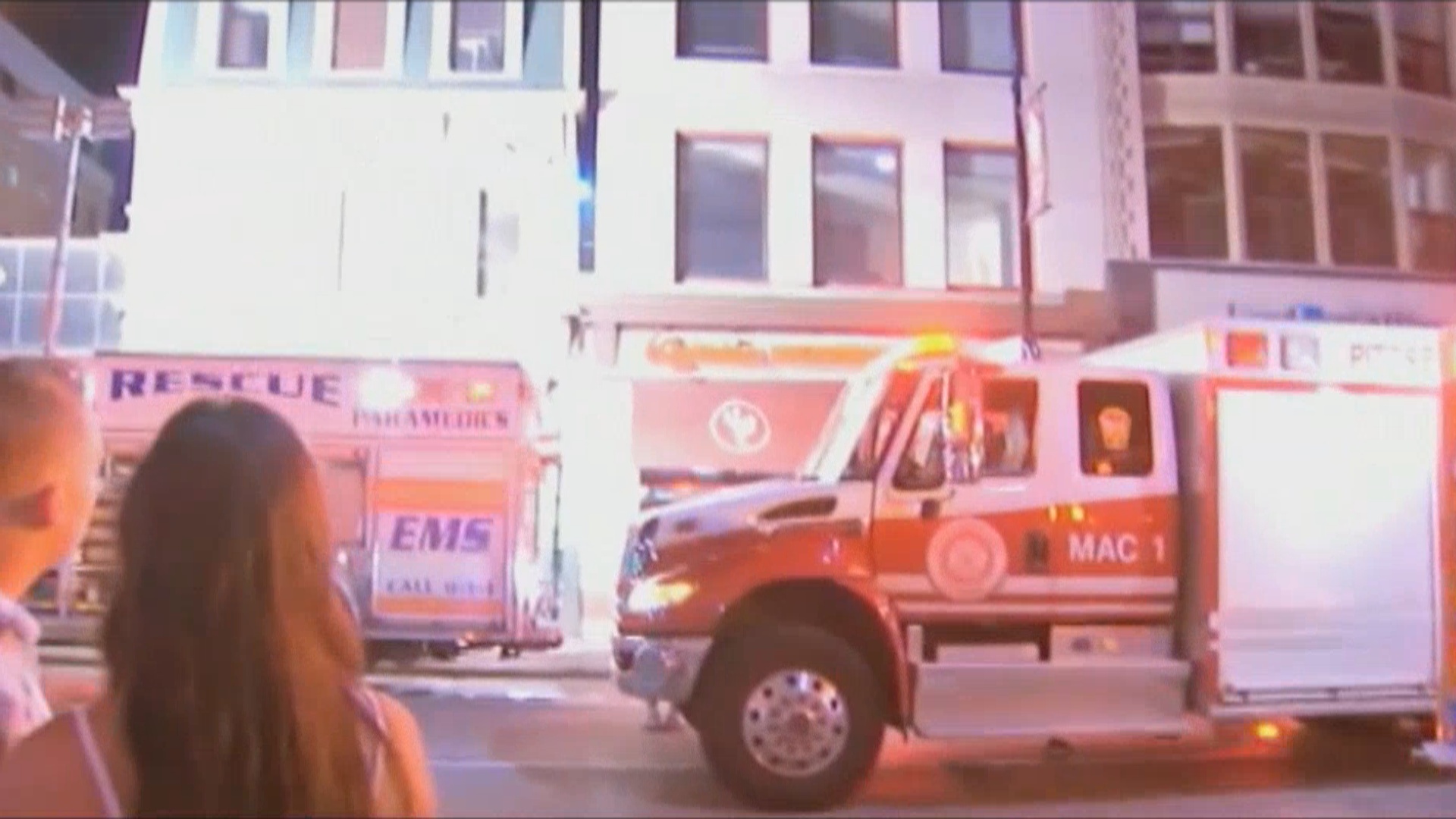 Man stuck between two buildings rescued after failed jump attempt to ...