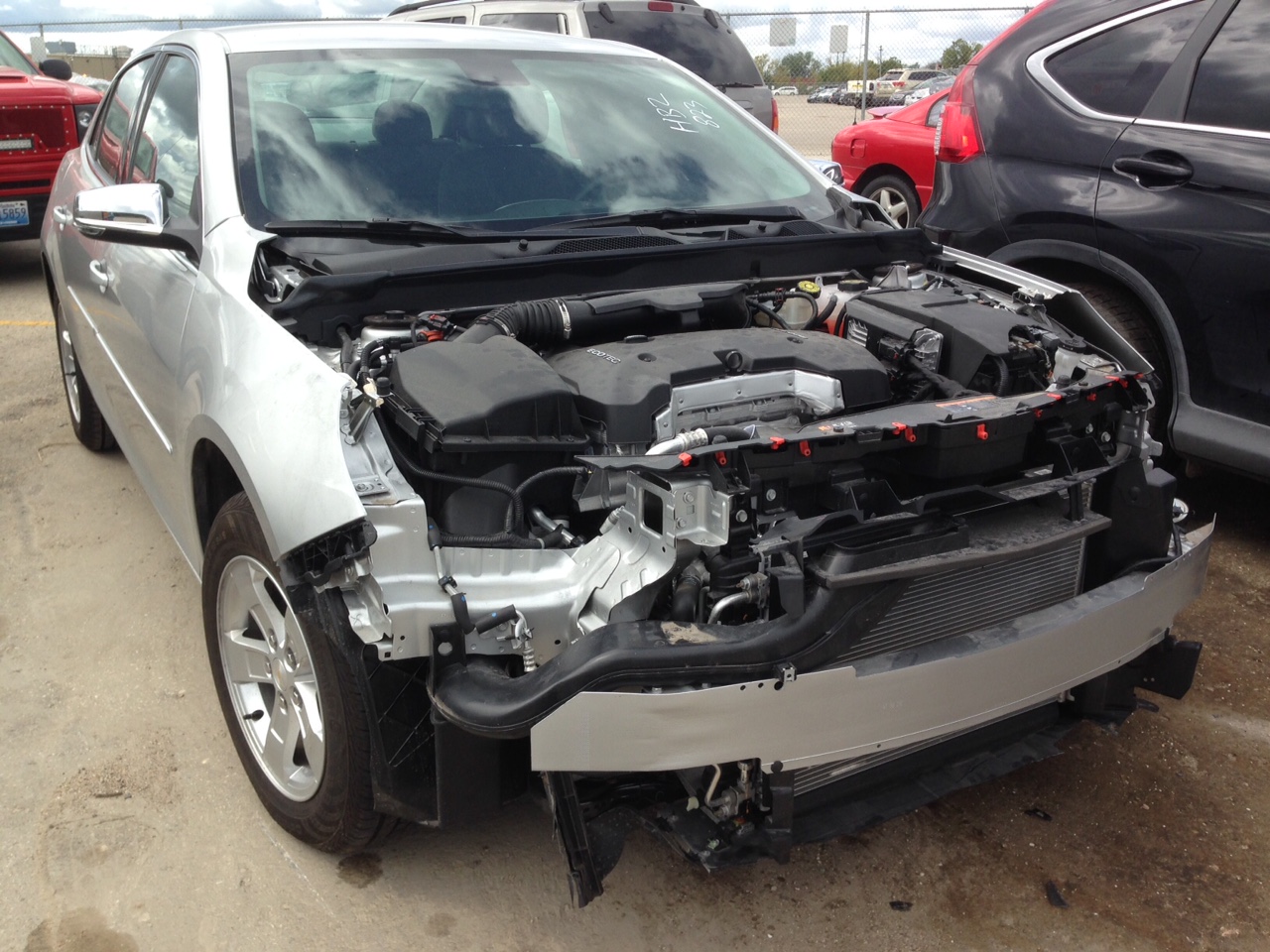 Car stripped of front end parts in St. James driveway - Winnipeg ...