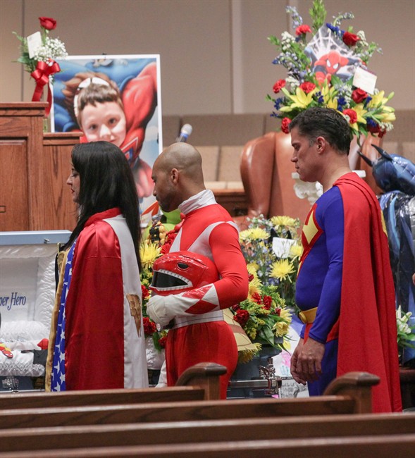 Mourners wear superhero costumes at funeral for 6-year-old fatally shot ...