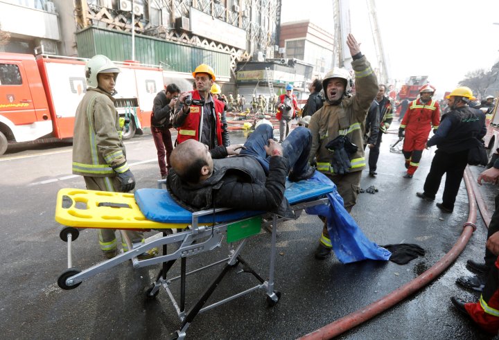 At least 20 firefighters feared dead after massive fire collapses ...