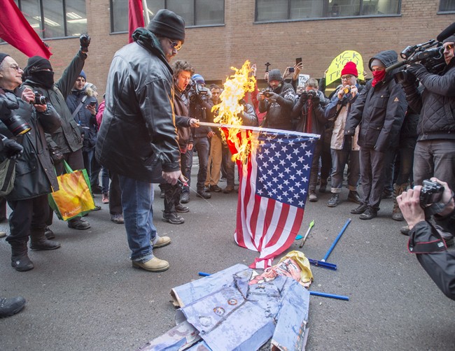 Donald Trump effigy, U.S. flag burned by protesters in Montreal ...