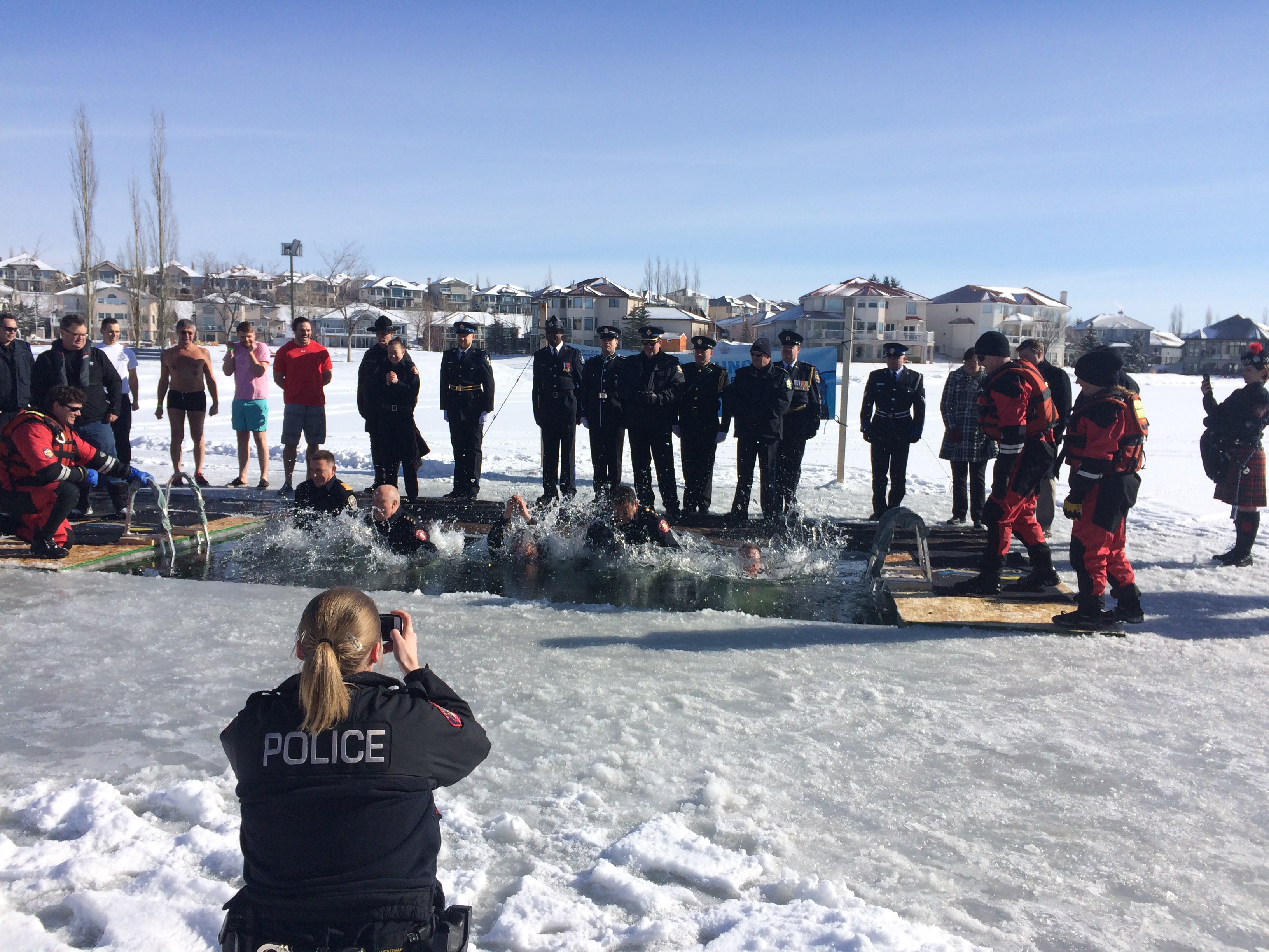 Dozens of Calgarians brave frozen lake for Polar Bear Plunge ...