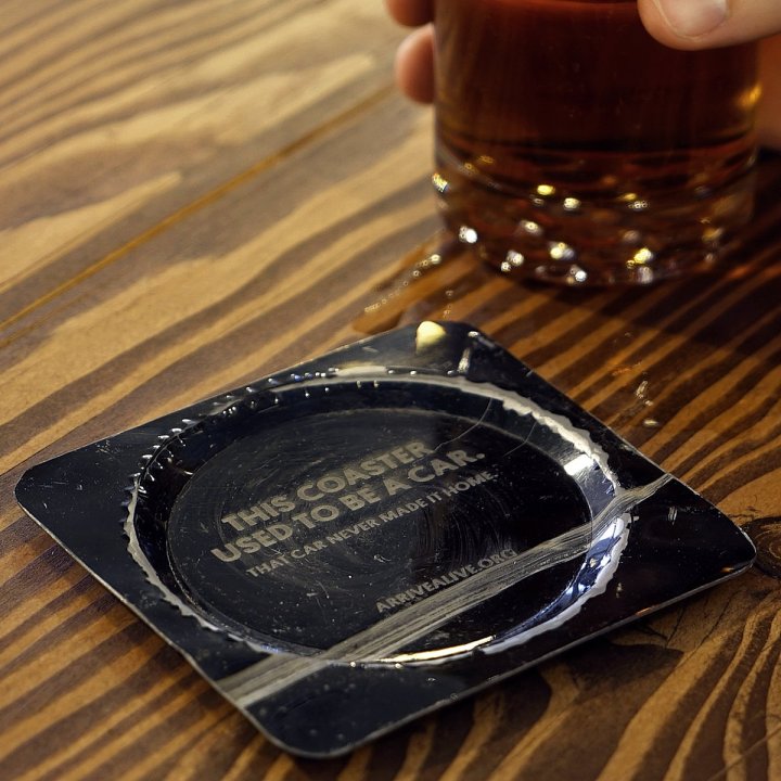 Toronto bar serves drinks on coasters made from cars that never made it ...
