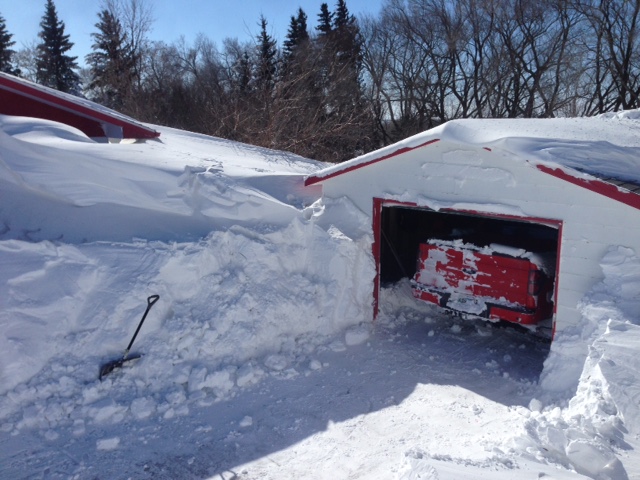 Southern Manitoba town opens doors to 20 foot snow drifts - Winnipeg ...
