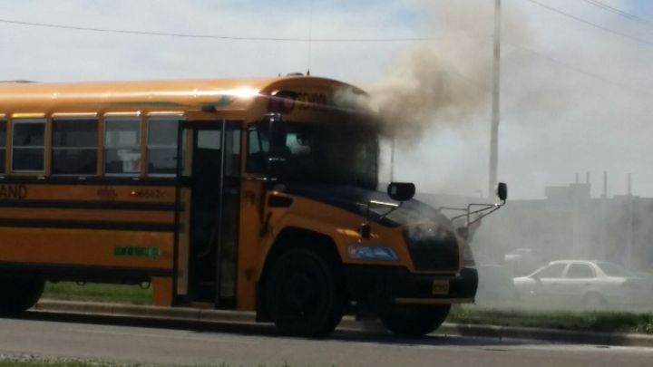 Dozens of children rescued after Calgary school bus catches fire ...
