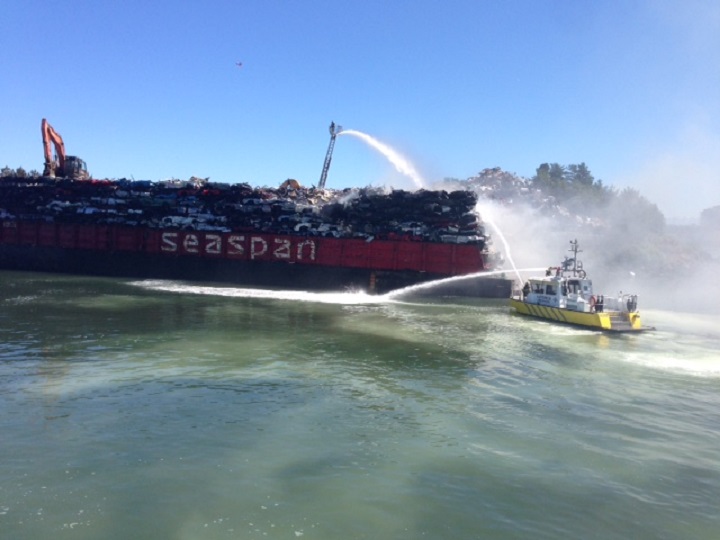 Crews working on extinguishing fire on barge in Victoria’s Gorge ...
