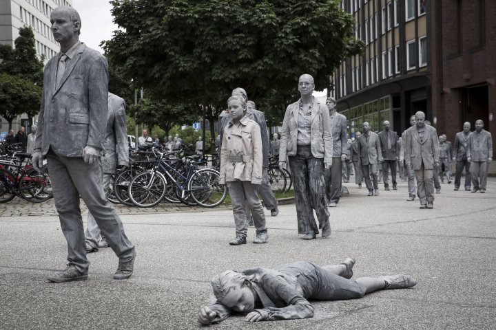 Zombie-like protesters march through Hamburg ahead of G20 Summit: In ...