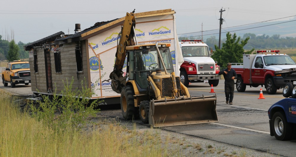 Modular home catches fire while being moved | Globalnews.ca