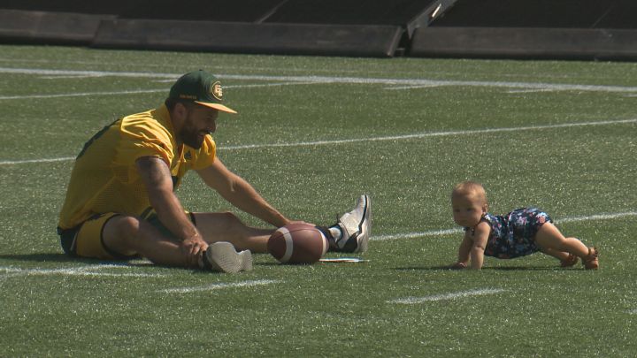Cute moment between Mike Reilly, daughter caught on camera at Edmonton ...