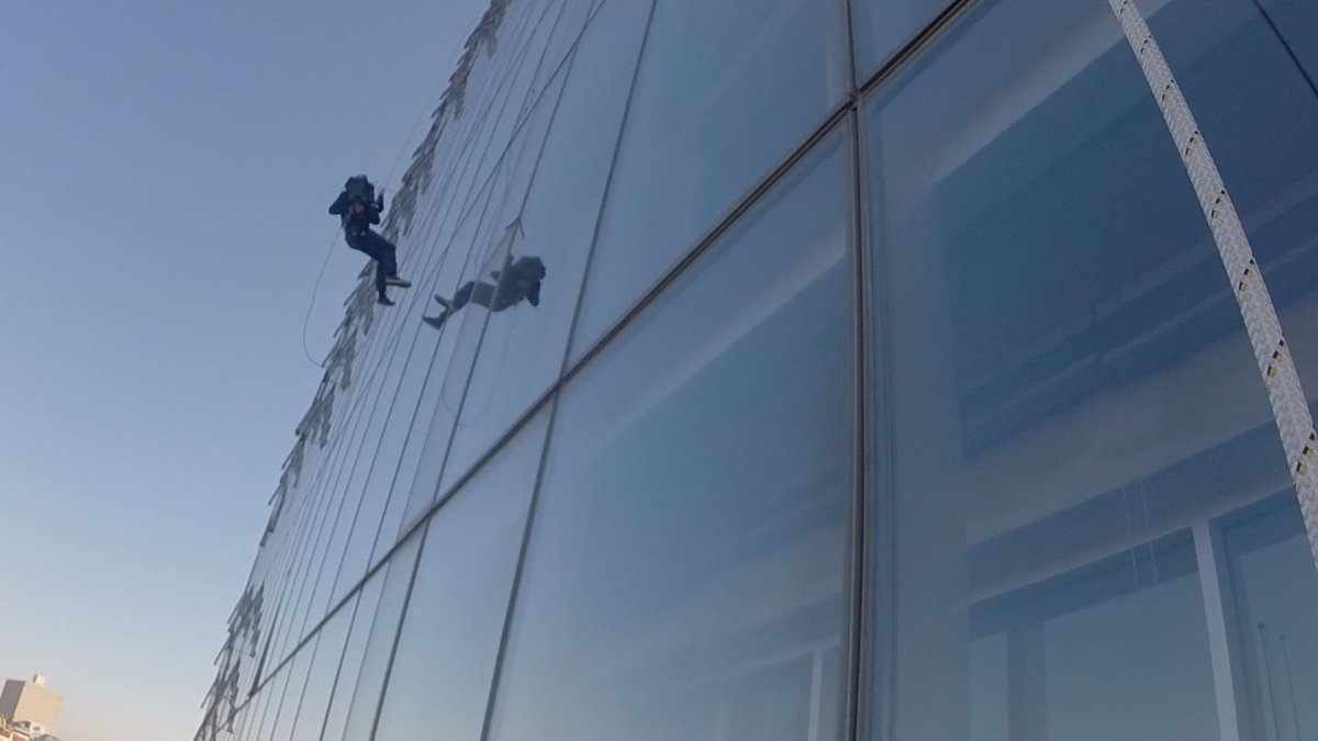 60 people rappel hundreds of feet down Winnipeg building for charity ...