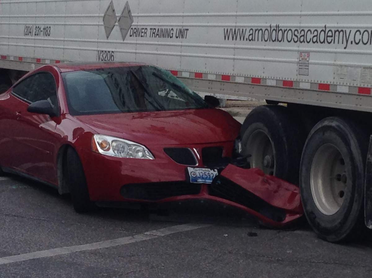 Crash involving semi and car in downtown Winnipeg slows traffic ...
