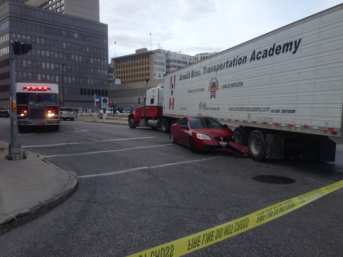 Crash involving semi and car in downtown Winnipeg slows traffic ...