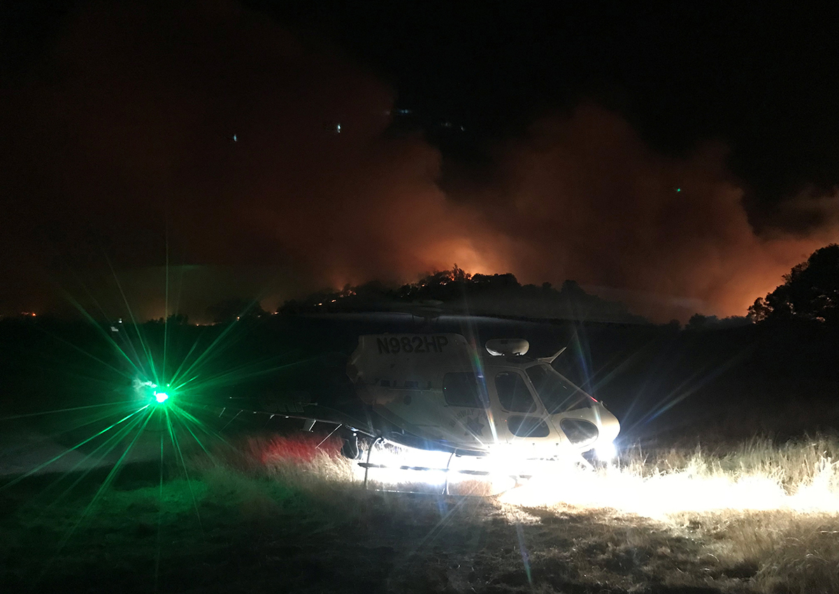 California wildfire: Helicopter saves 42 people, 5 dogs and cat from ...