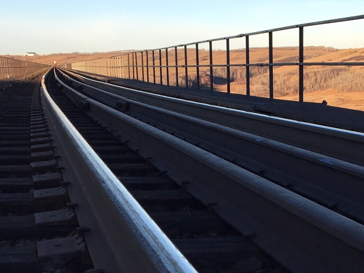 13 train cars derail off historic CN trestle bridge near Wainwright in ...