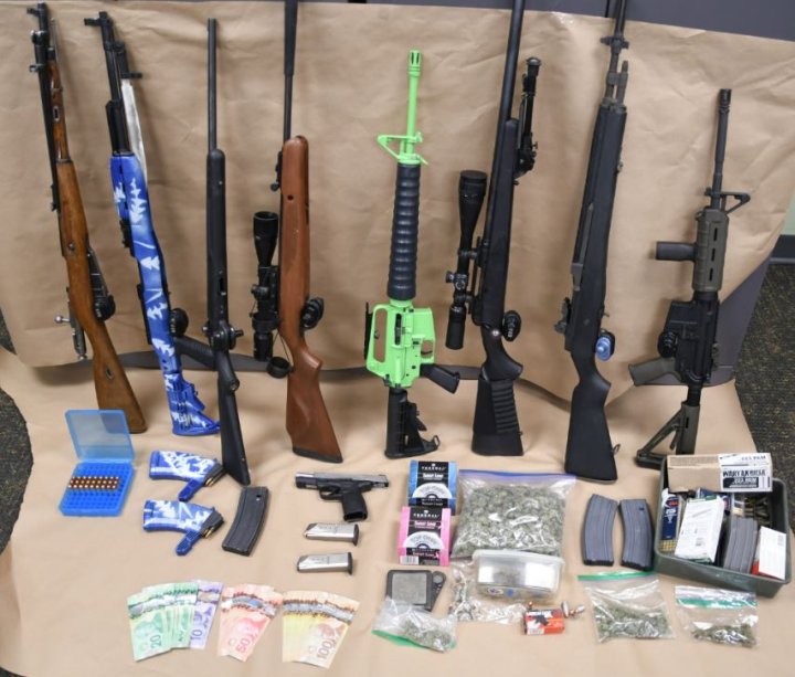 London man, 32, facing 11 charges after police seized 8 guns, some ...