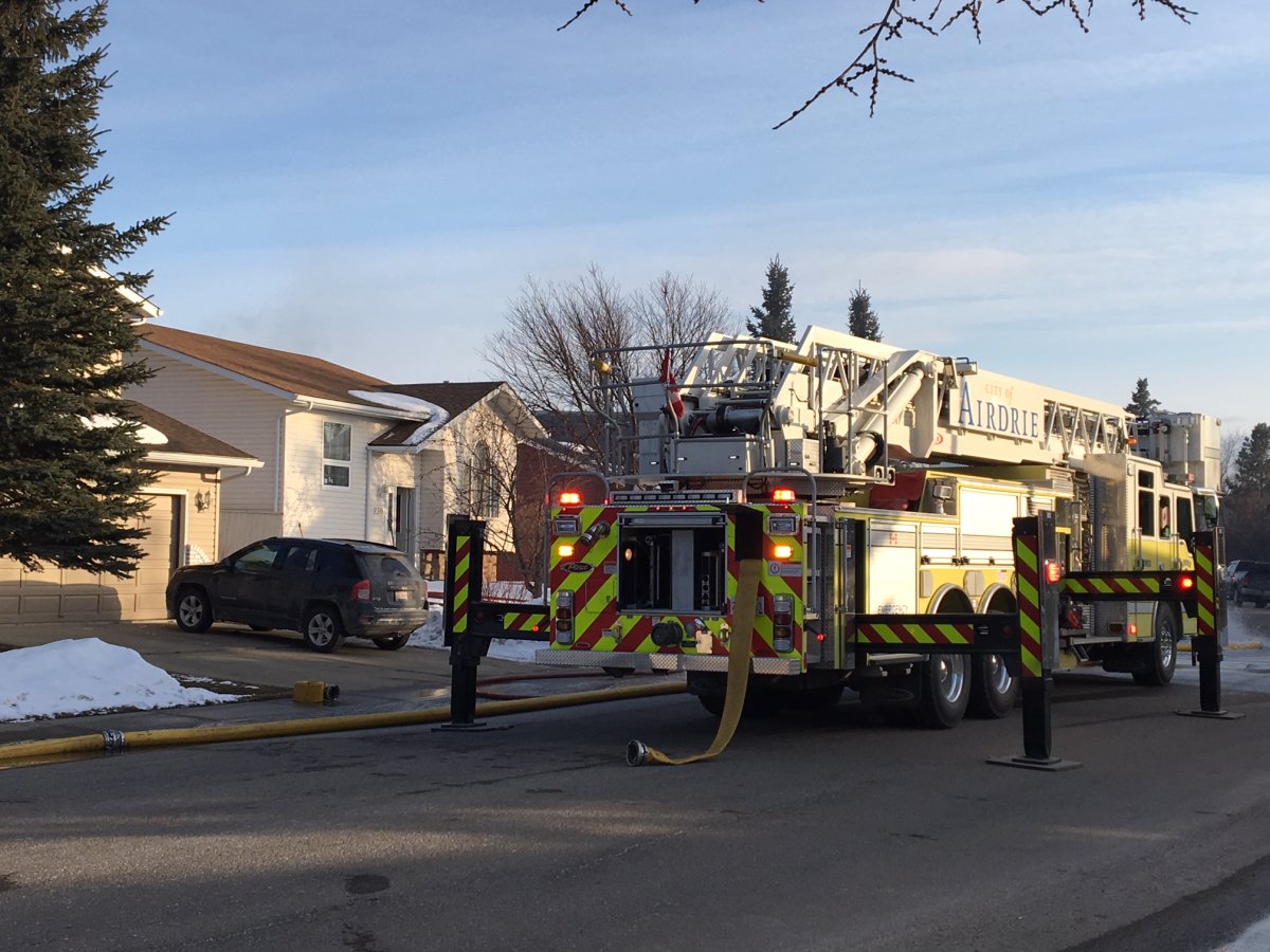 3 homes in Airdrie evacuated as firefighters fight ‘large’ garage fire ...