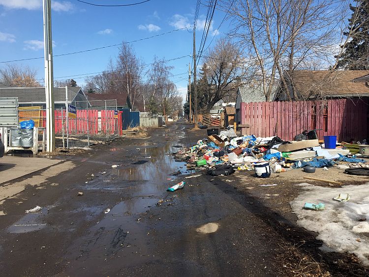 Large trash pile in Edmonton alley to be removed Friday - Edmonton ...