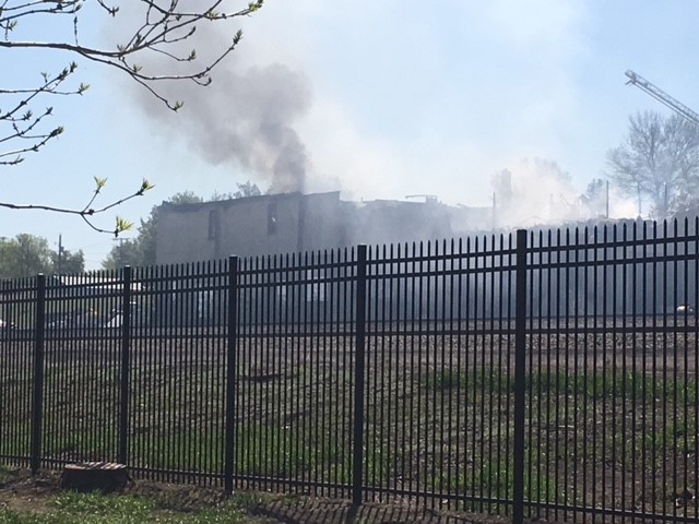 Hundreds evacuated and crews still working after massive fire in ...