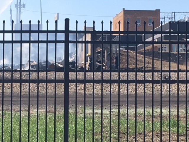 Hundreds evacuated and crews still working after massive fire in ...