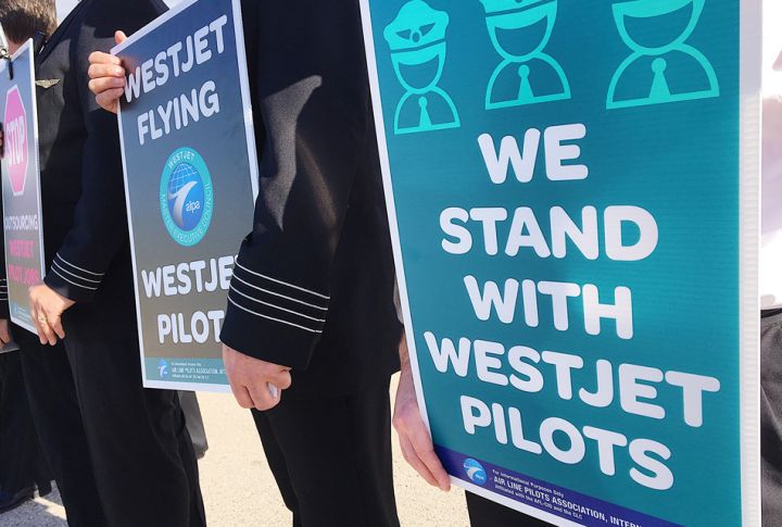 Pilots demand better working conditions outside WestJet headquarters as ...