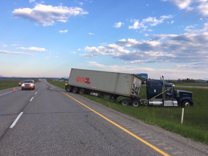 Police investigate collision on Highway 1 southwest of Cochrane ...