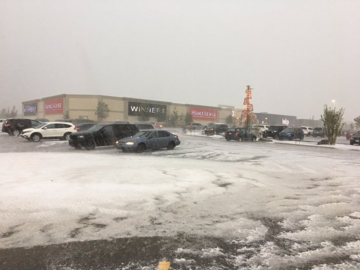 Hail, heavy rain and flooding seen in Calgary and surrounding area as ...