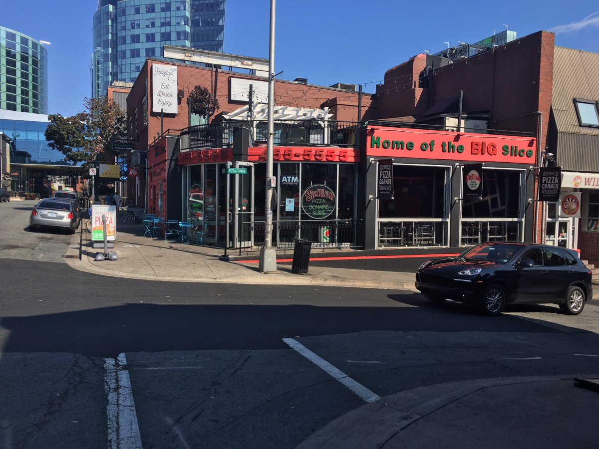Municipality says Pizza Corner signs in downtown Halifax need to be ...