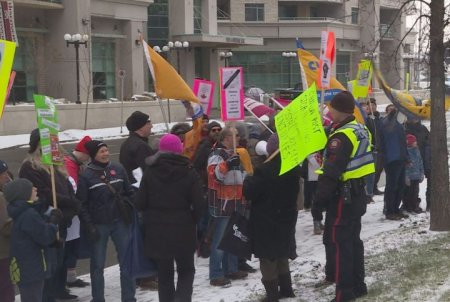 ‘It’s an attack on all our rights’: Hundreds rally in Edmonton, Calgary ...