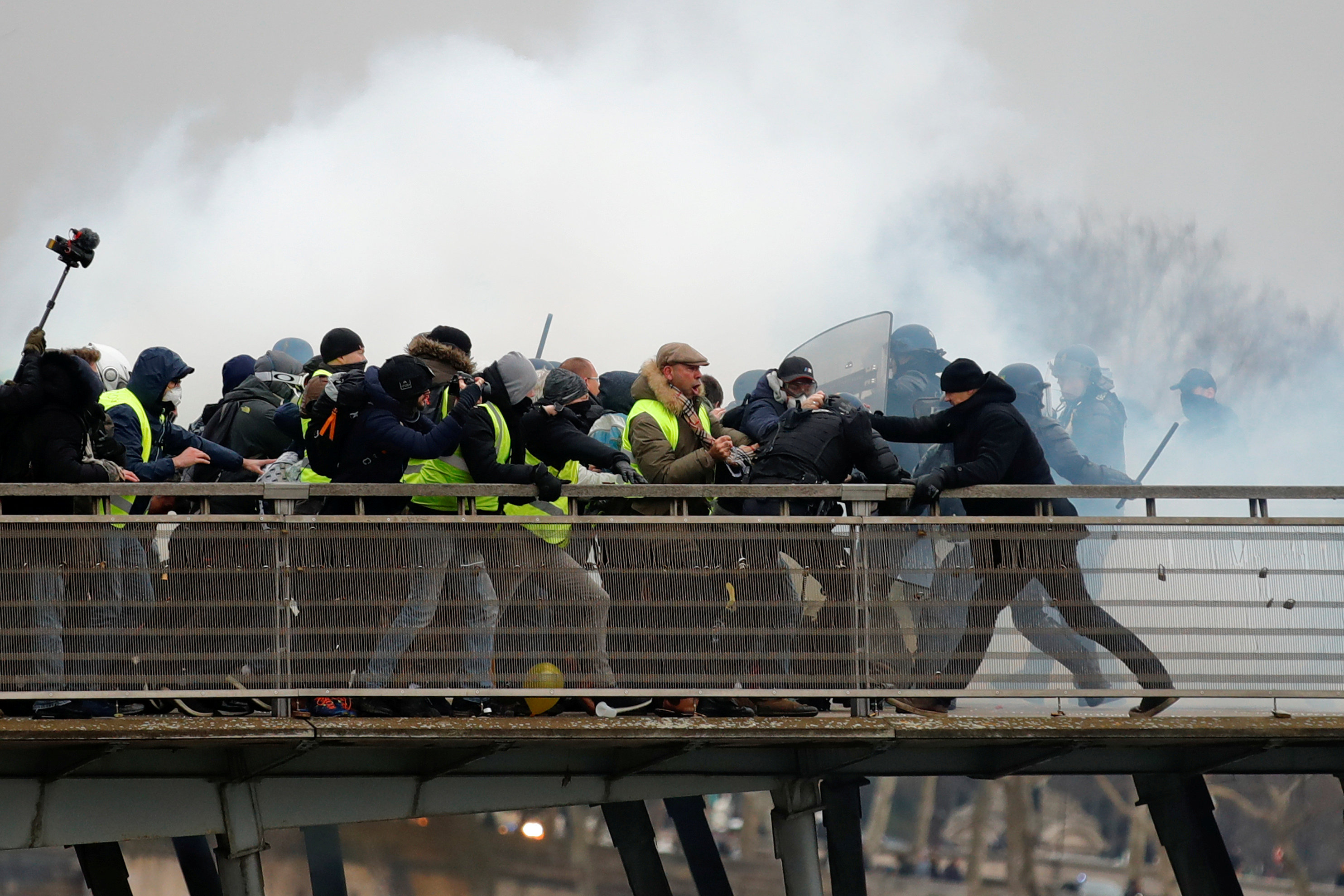 Over $170K raised for ex-French boxer who punched riot police during ...