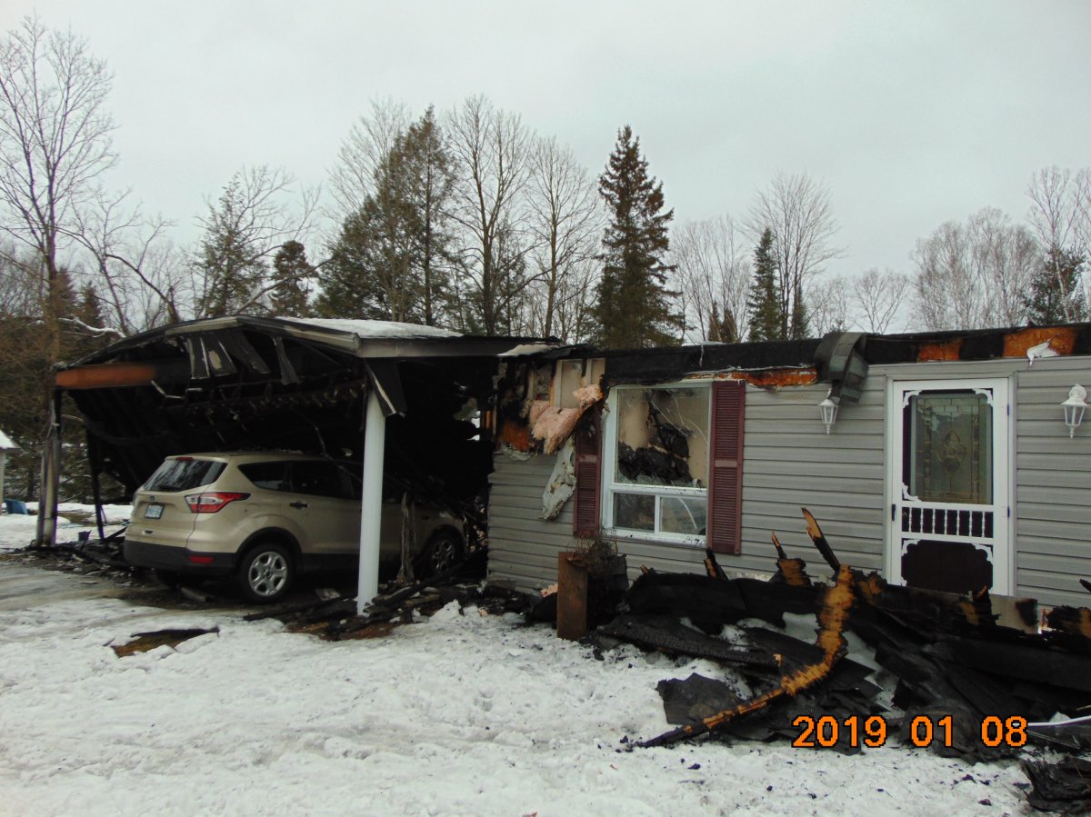Family escapes as early morning fire tears through house near ...