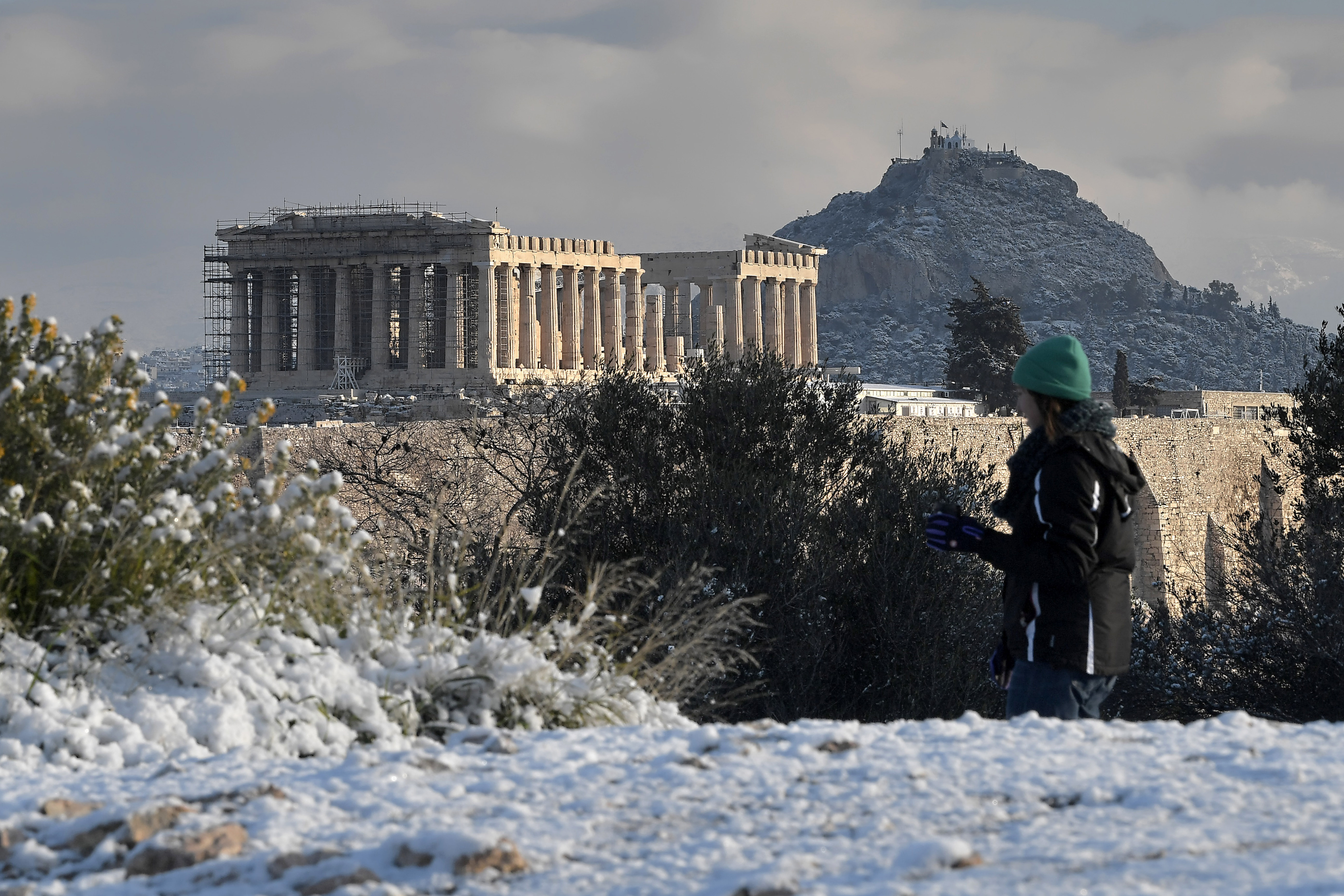 Rare snowfall blankets Athens as temperatures across Greece hit record ...