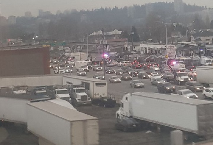 Armed suspect at large after Transit police officer shot near Scott ...