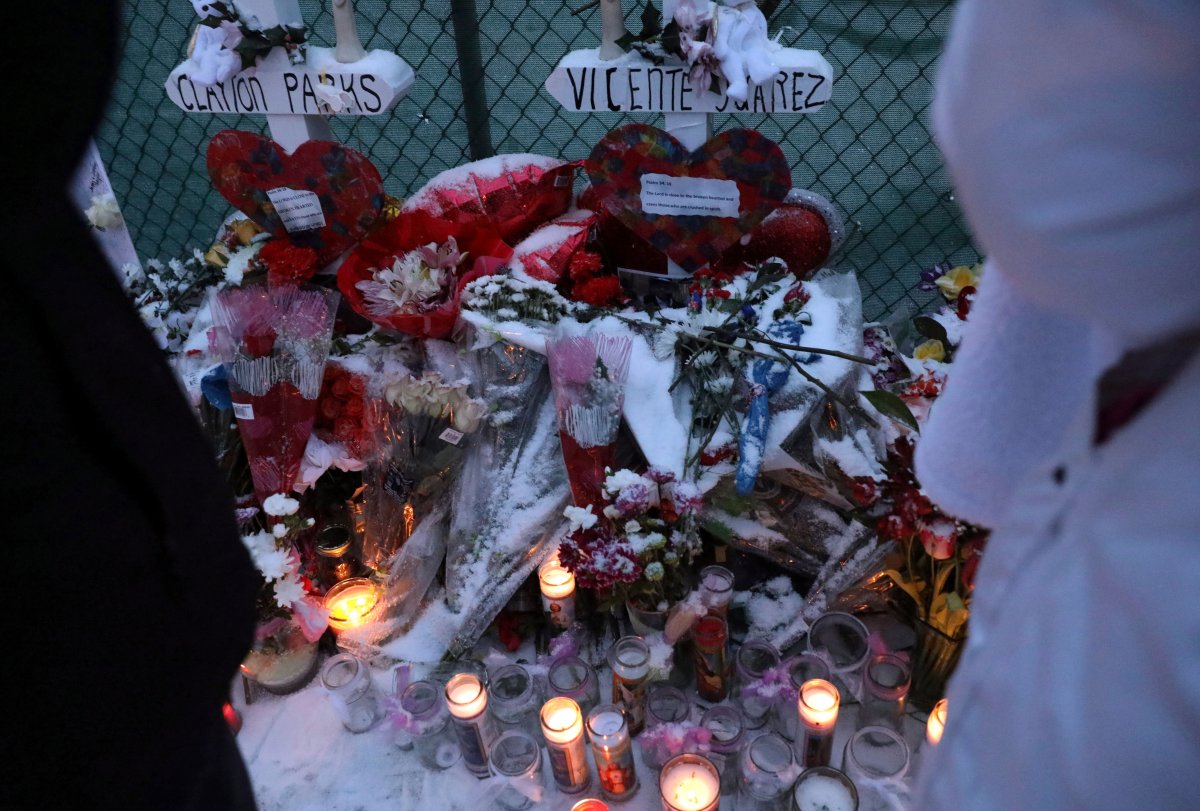 More than 1,500 brave freezing rain to honour Aurora shooting victims ...
