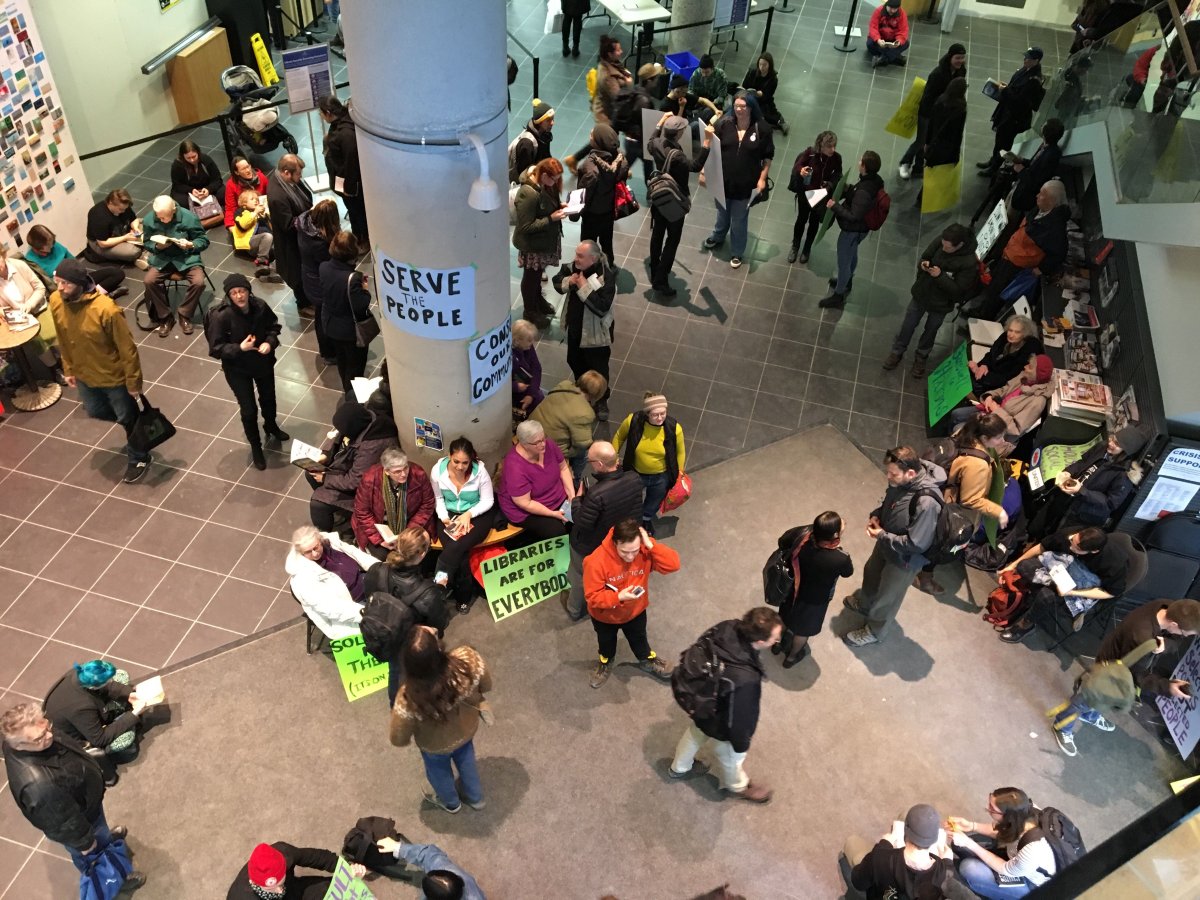 Read-in participants protest against Millennium Library security ...