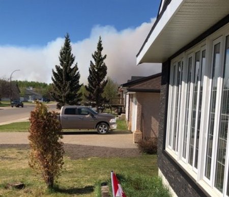 High Level, surrounding areas evacuated as wildfire burns in ...