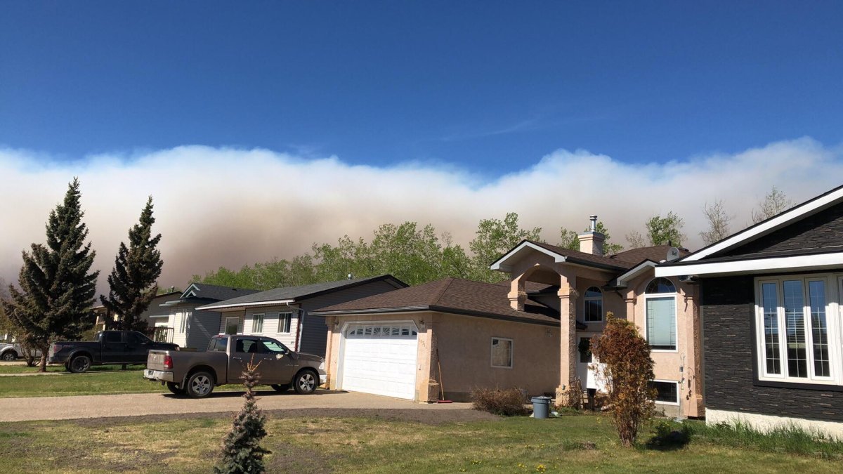 High Level, surrounding areas evacuated as wildfire burns in ...