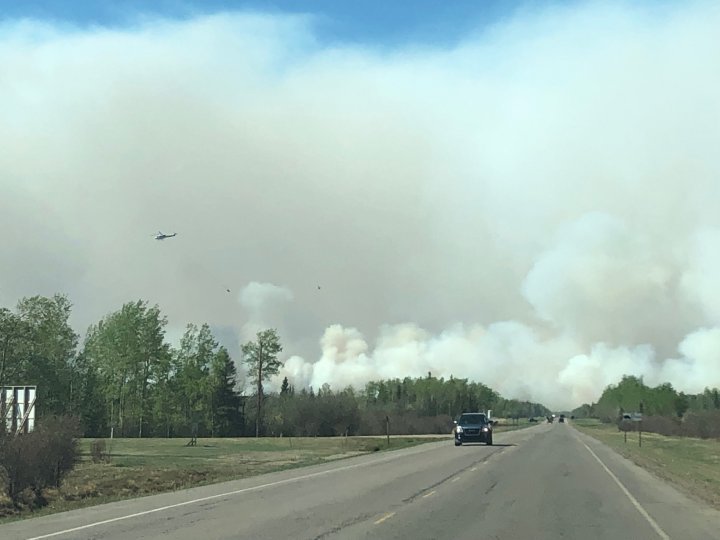 High Level, surrounding areas evacuated as wildfire burns in ...
