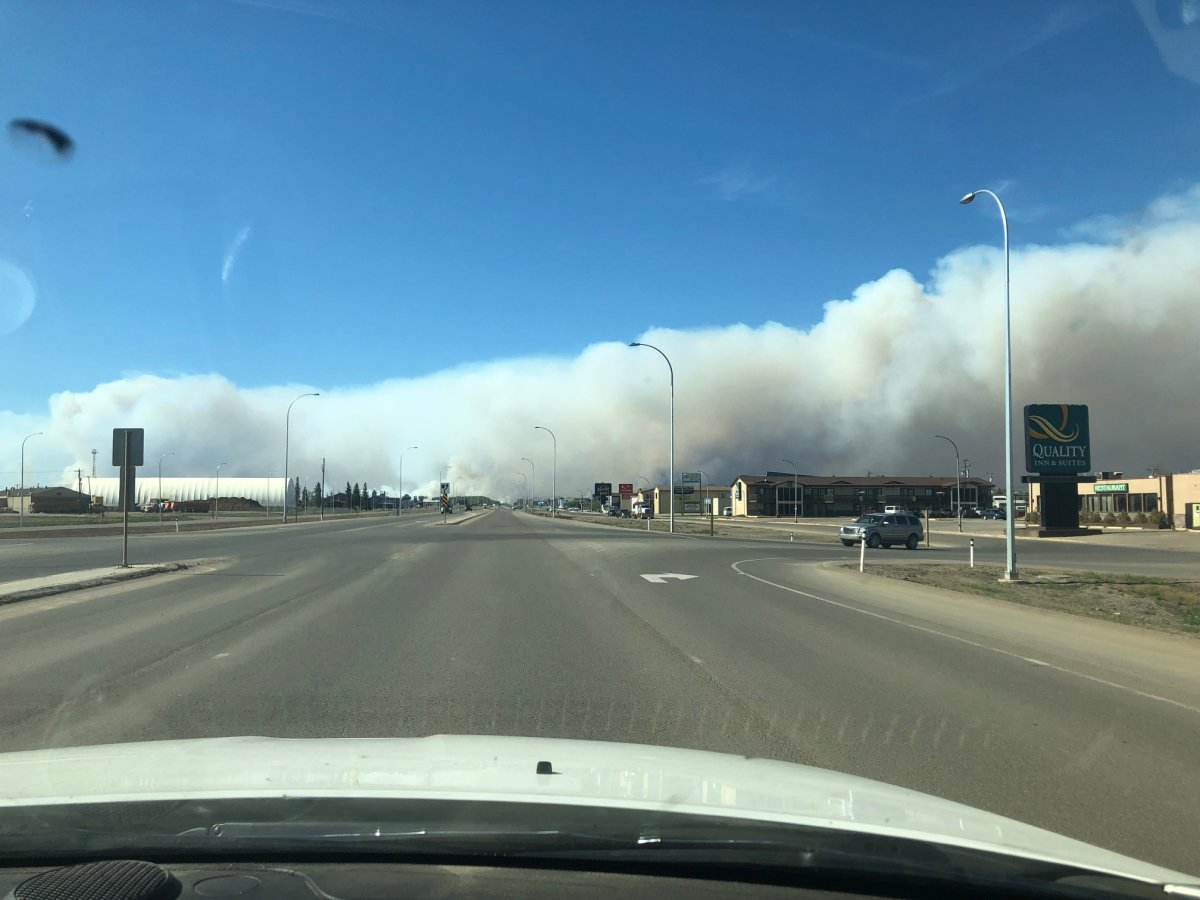 High Level, surrounding areas evacuated as wildfire burns in ...