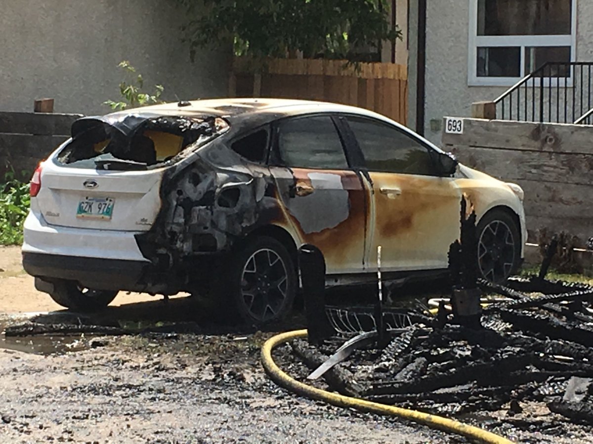 Fire tears through garage, carport in Winnipeg’s west end - Winnipeg ...