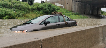 Heavy rain in Toronto causes localized flooding across roadways ...
