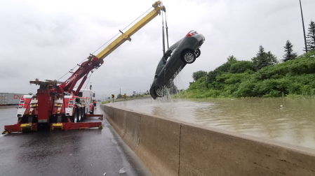 Heavy rain in Toronto causes localized flooding across roadways ...