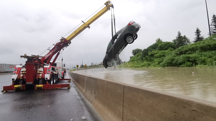 Heavy rain in Toronto causes localized flooding across roadways ...