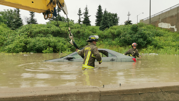 Heavy rain in Toronto causes localized flooding across roadways ...