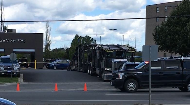 Man seriously hurt as vehicle falls from top of car carrier: Kingston ...