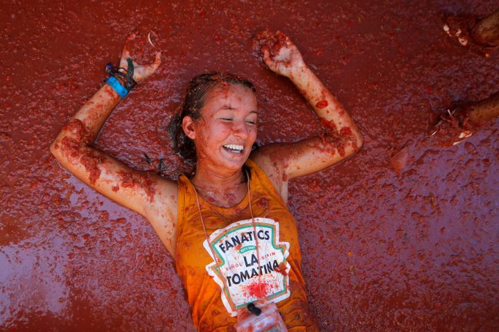 La Tomatina: Epic tomato fight leaves Spanish town stained by saucy ...